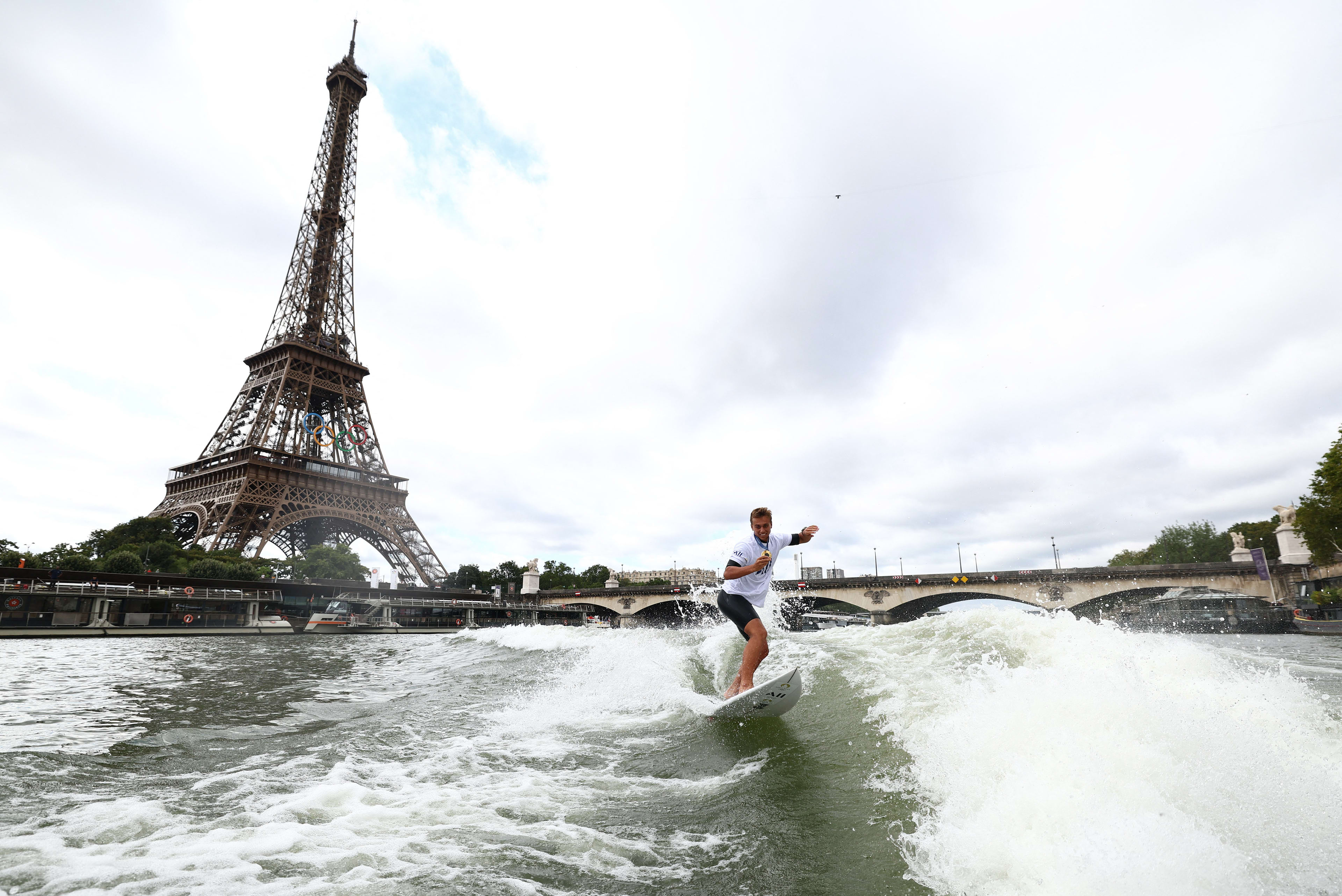 Kauli Vaast Surfs Seine River, Takes Olympic Gold Victory Lap in Paris ...